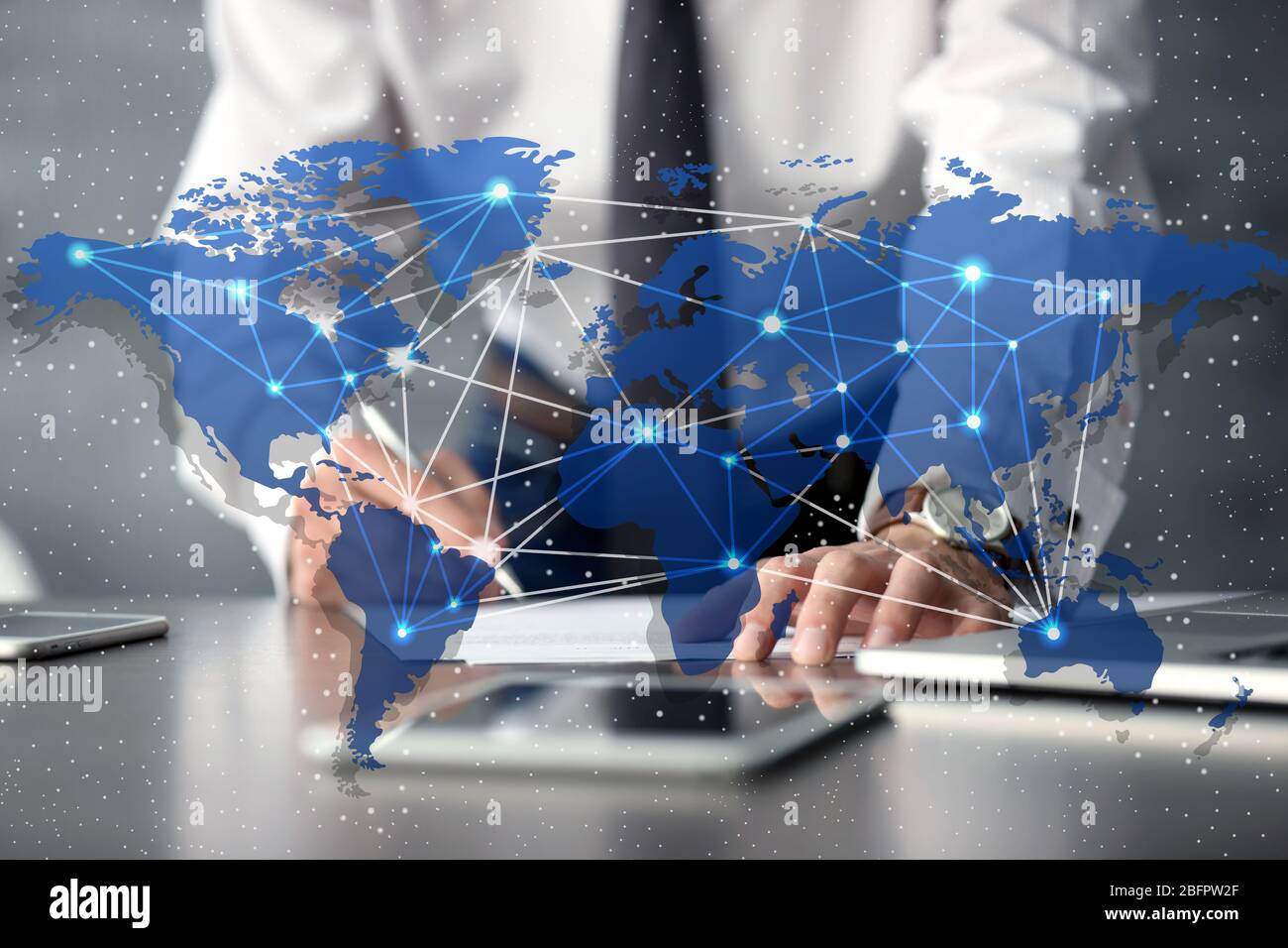 Concept of consulting. World map and lawyer signing documents on ...