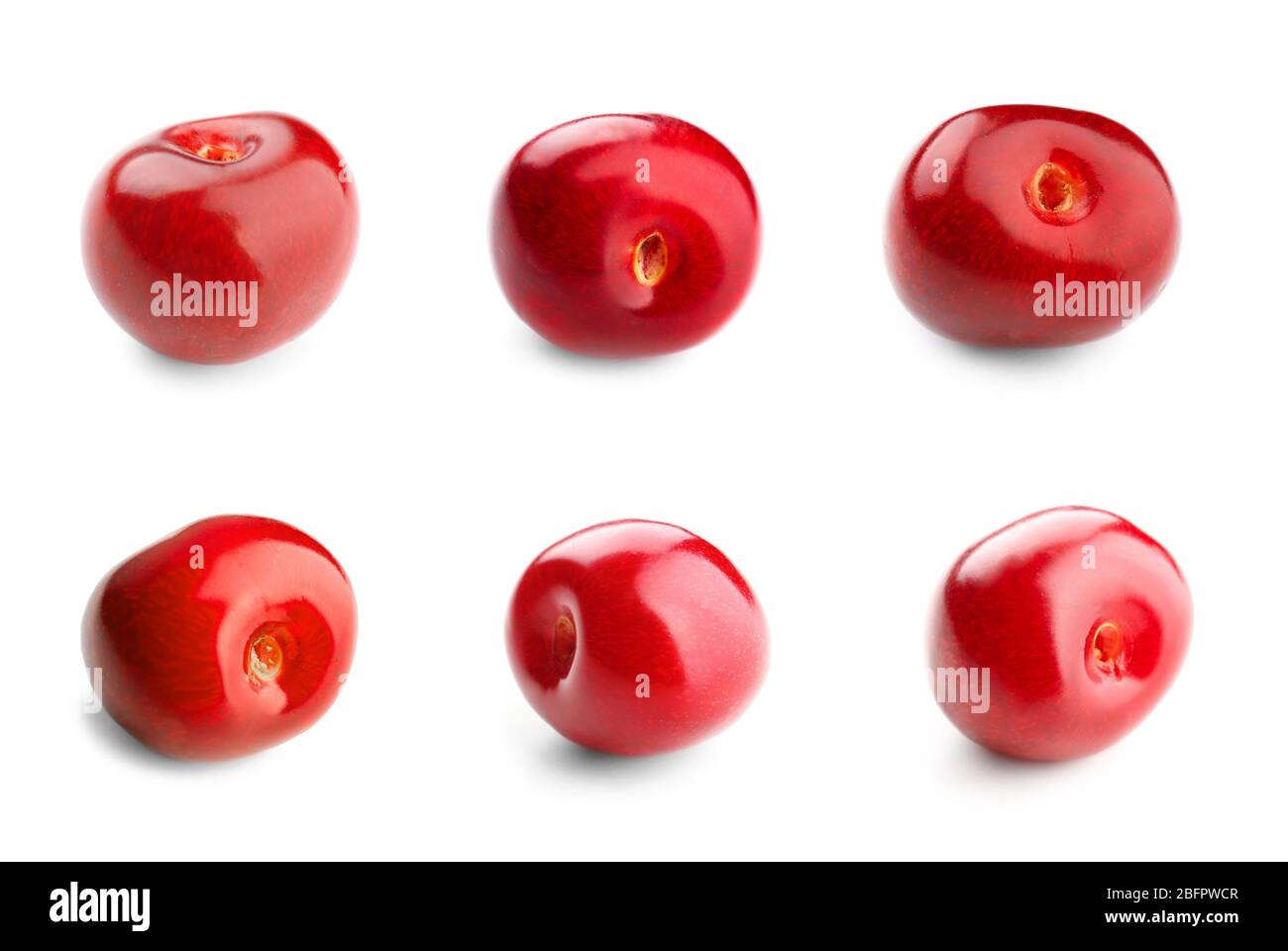 Collage of red cherries on white background Stock Photo - Alamy