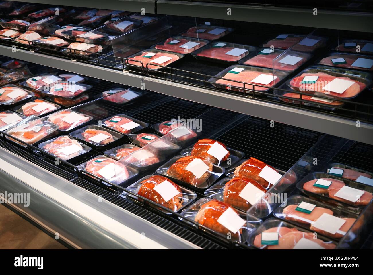 Shelves with fresh meat in supermarket Stock Photo - Alamy