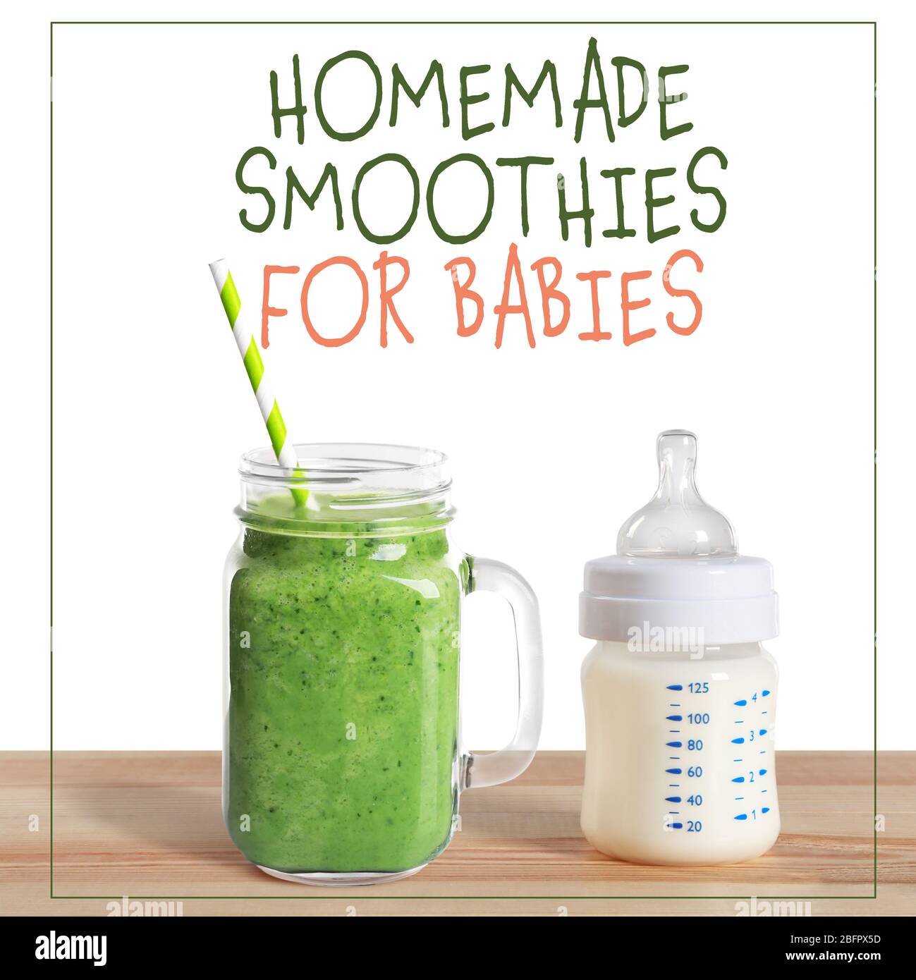 Feeding bottle with milk and glass jar of smoothie on wooden table ...