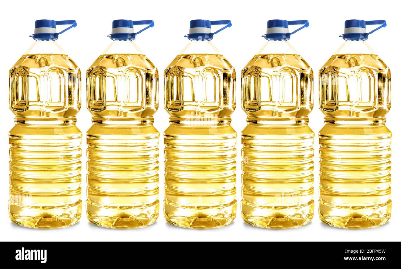 Bottles with cooking oil on white background Stock Photo - Alamy