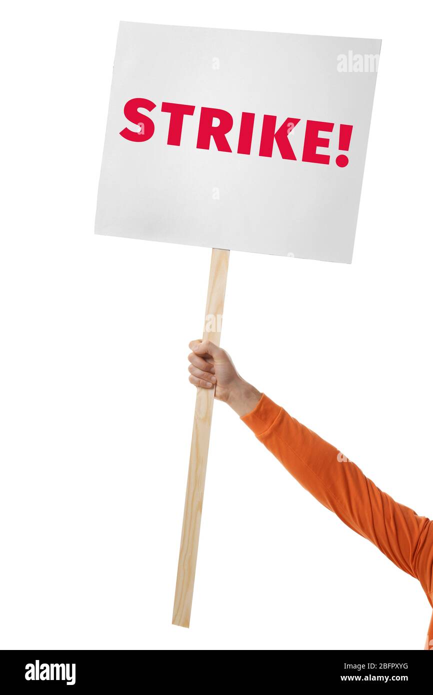 Man holding signboard with word STRIKE on white background Stock Photo ...