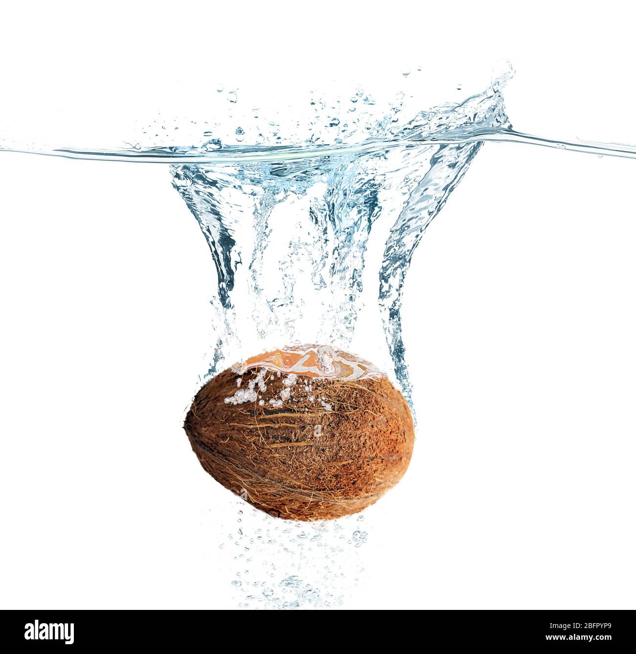 Coconut underwater on white background Stock Photo - Alamy