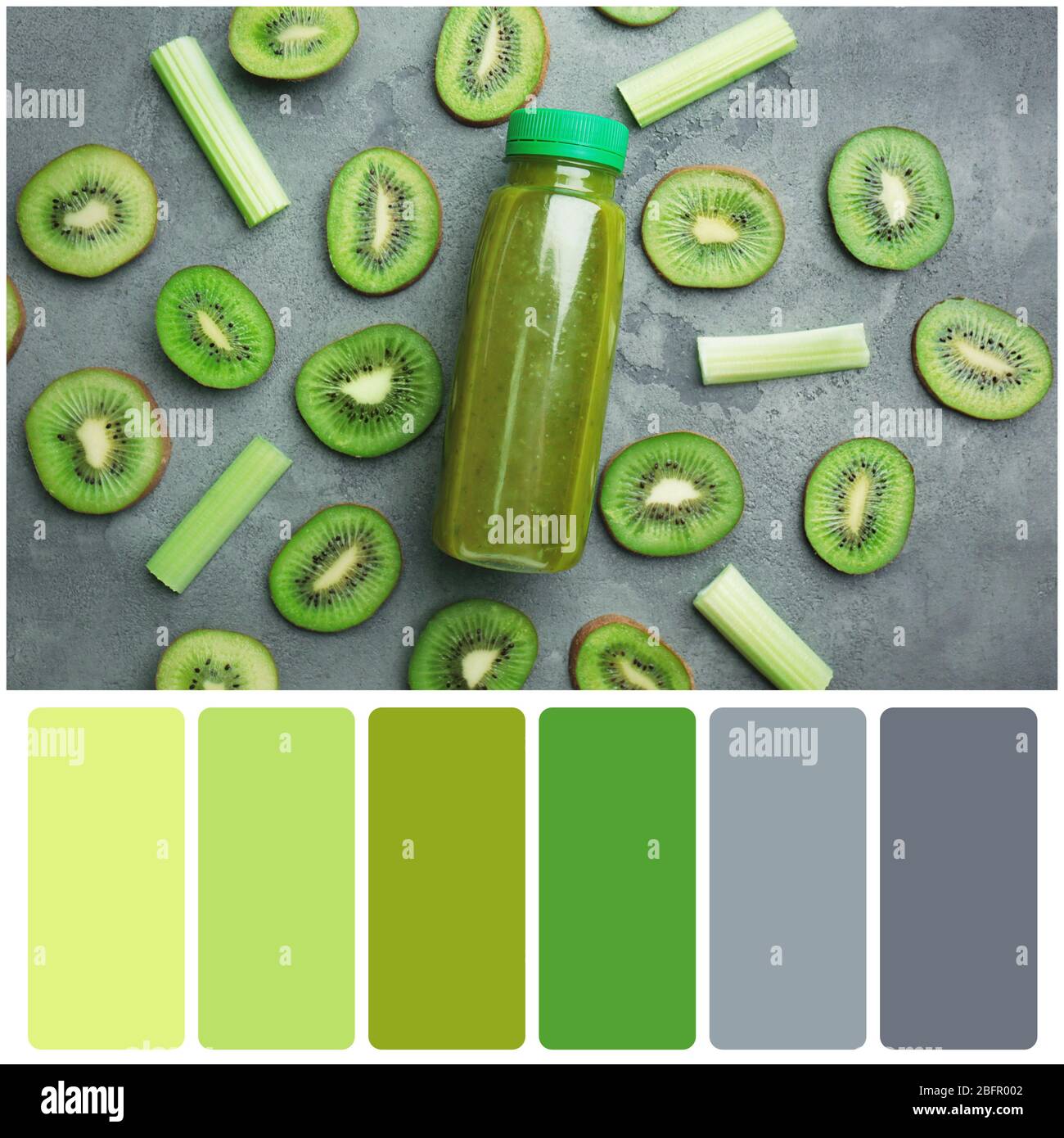 Color palette, bottle of smoothie and sliced ingredients on gray ...