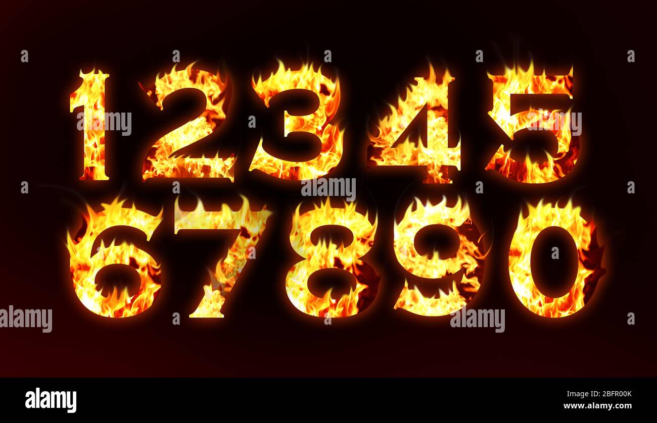 Burning numbers on black background Stock Photo - Alamy