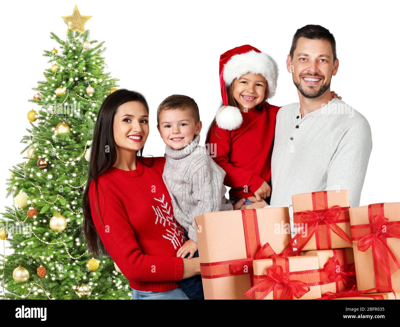 Happy family with gift boxes and decorated Christmas tree on white ...