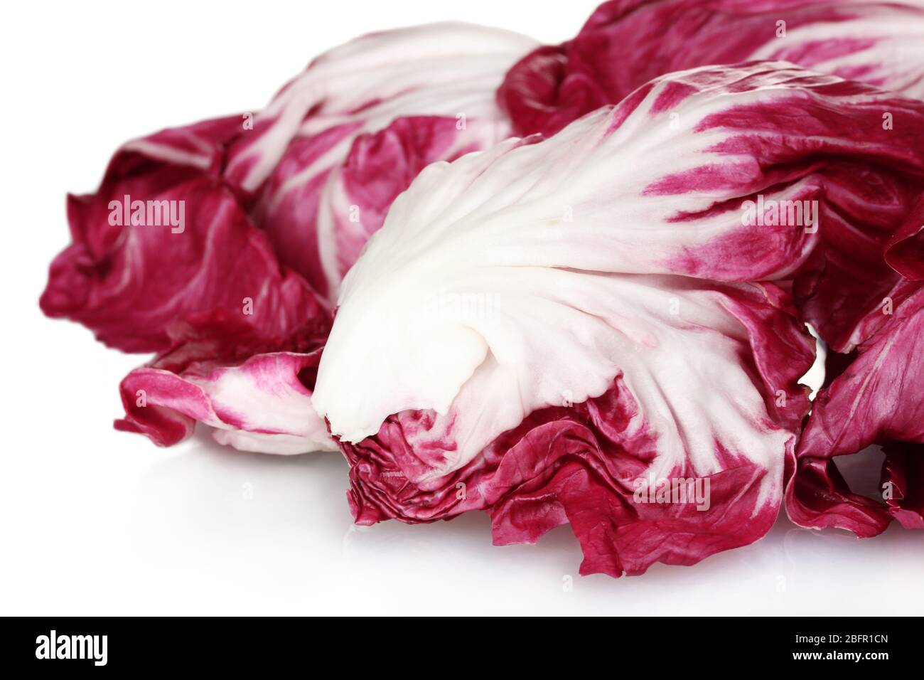 Red cabbage leaves isolated on white Stock Photo - Alamy