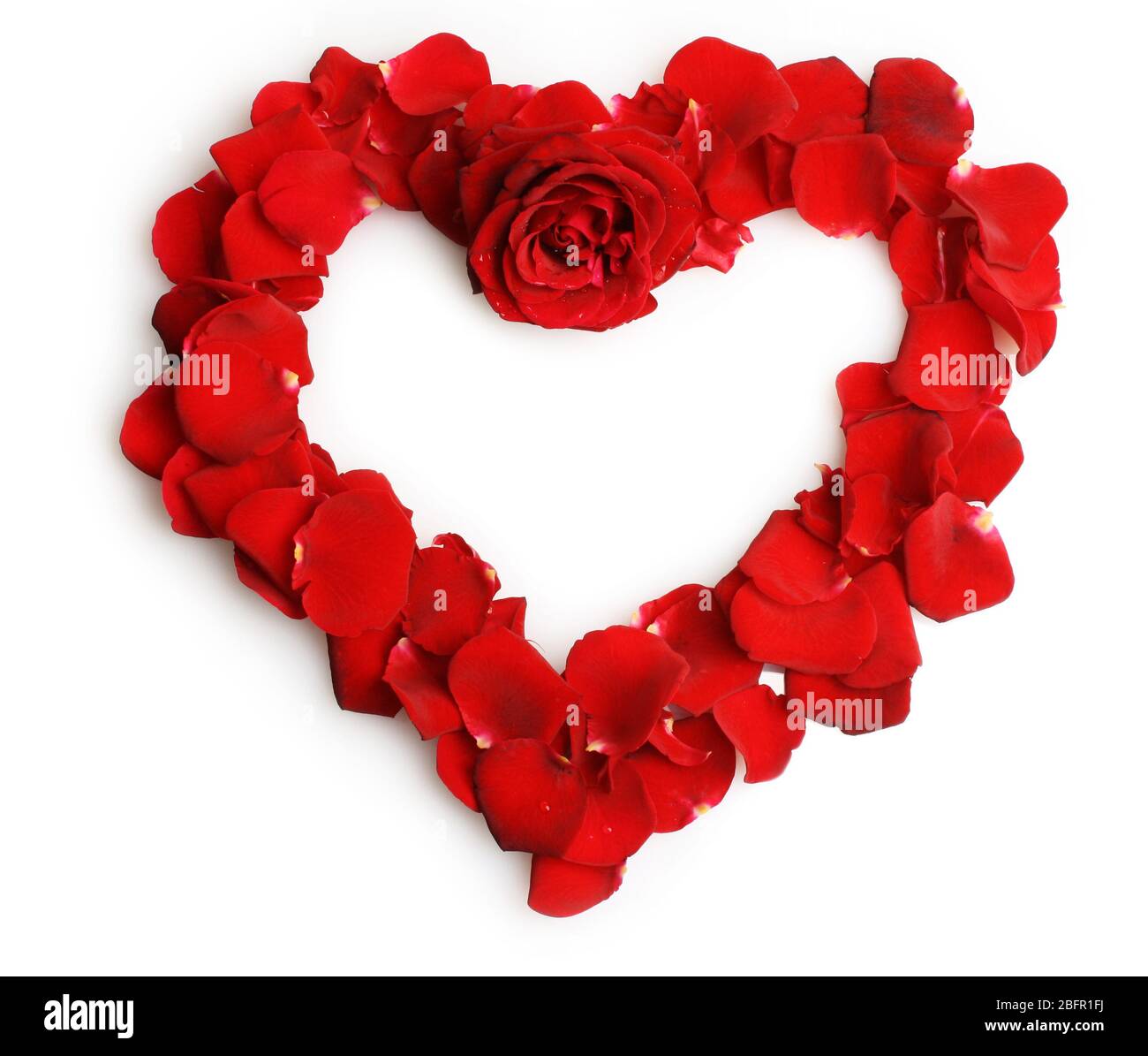 beautiful heart of red rose petals isolated on white Stock Photo - Alamy