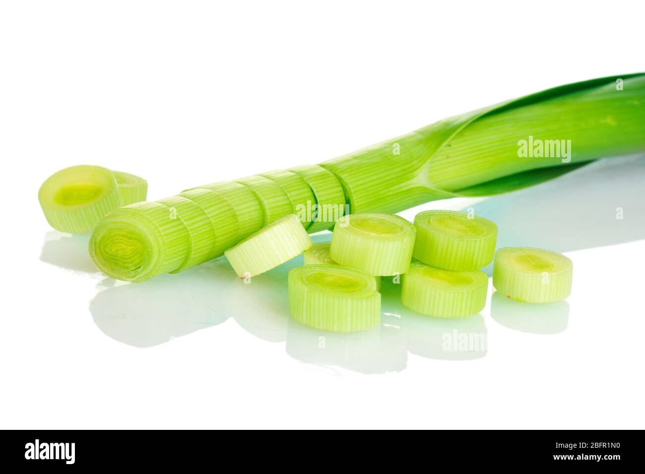 sliced leek isolated on white Stock Photo - Alamy