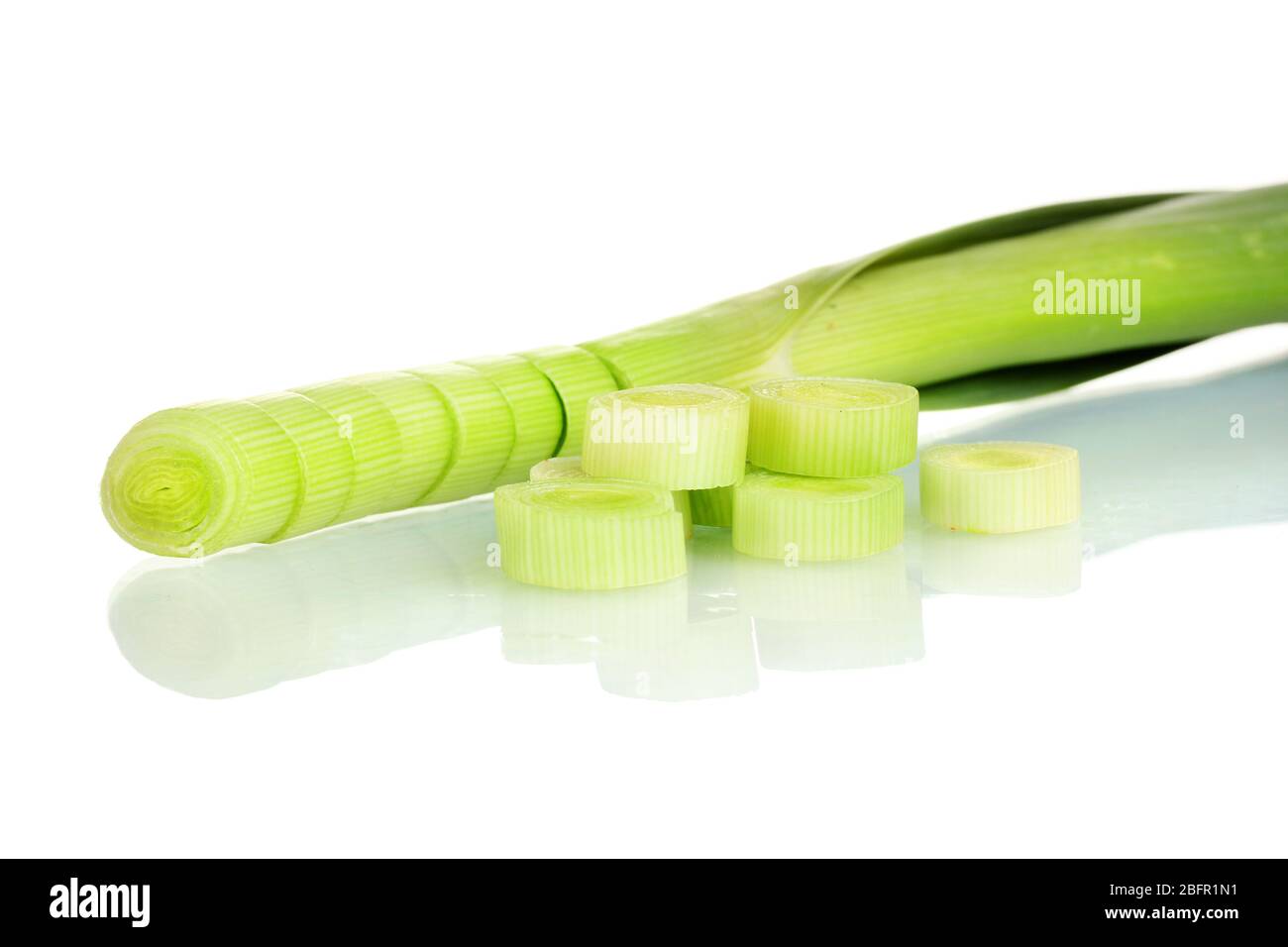 sliced leek isolated on white Stock Photo - Alamy