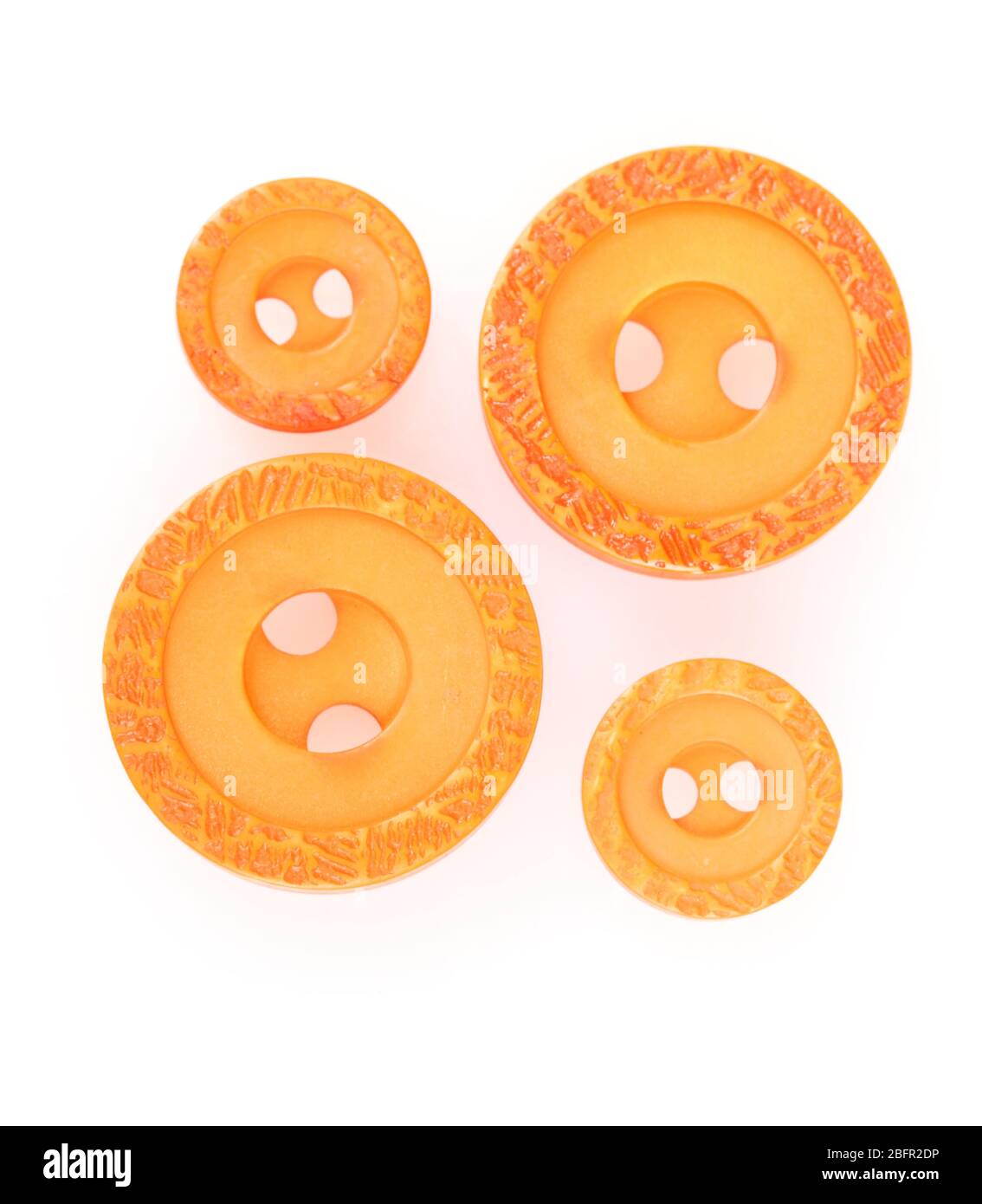bright orange sewing buttons isolated on white Stock Photo - Alamy
