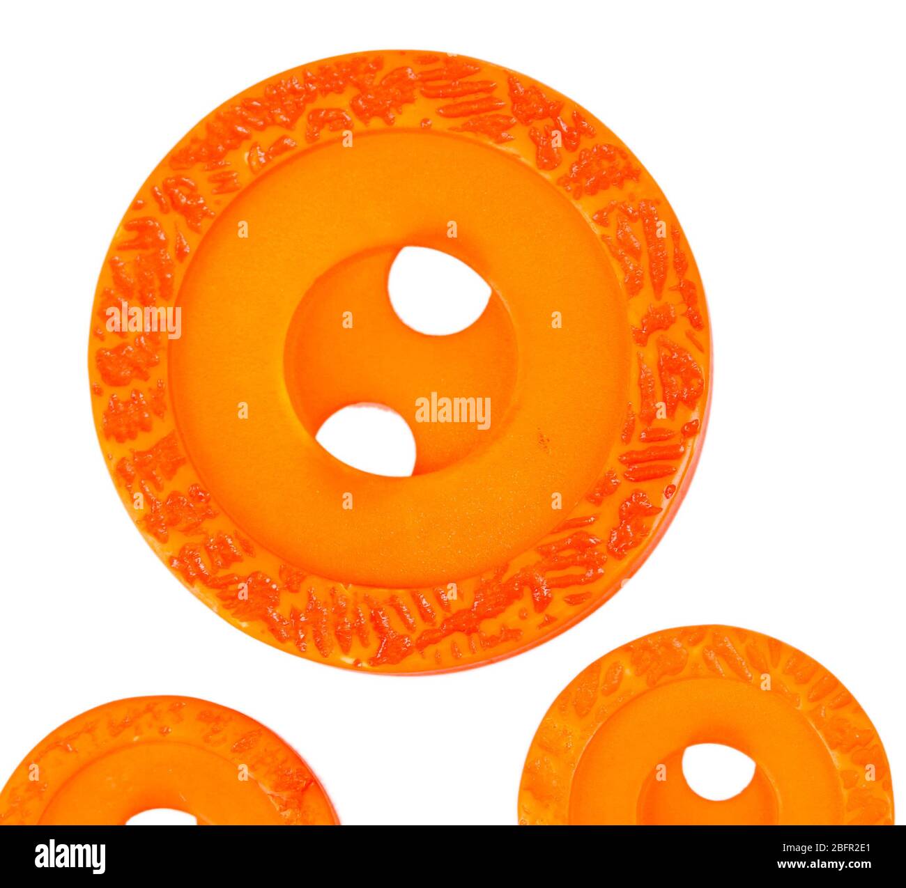 bright orange sewing buttons isolated on white Stock Photo - Alamy