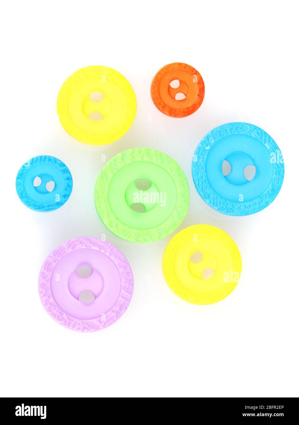bright sewing buttons isolated on white Stock Photo - Alamy