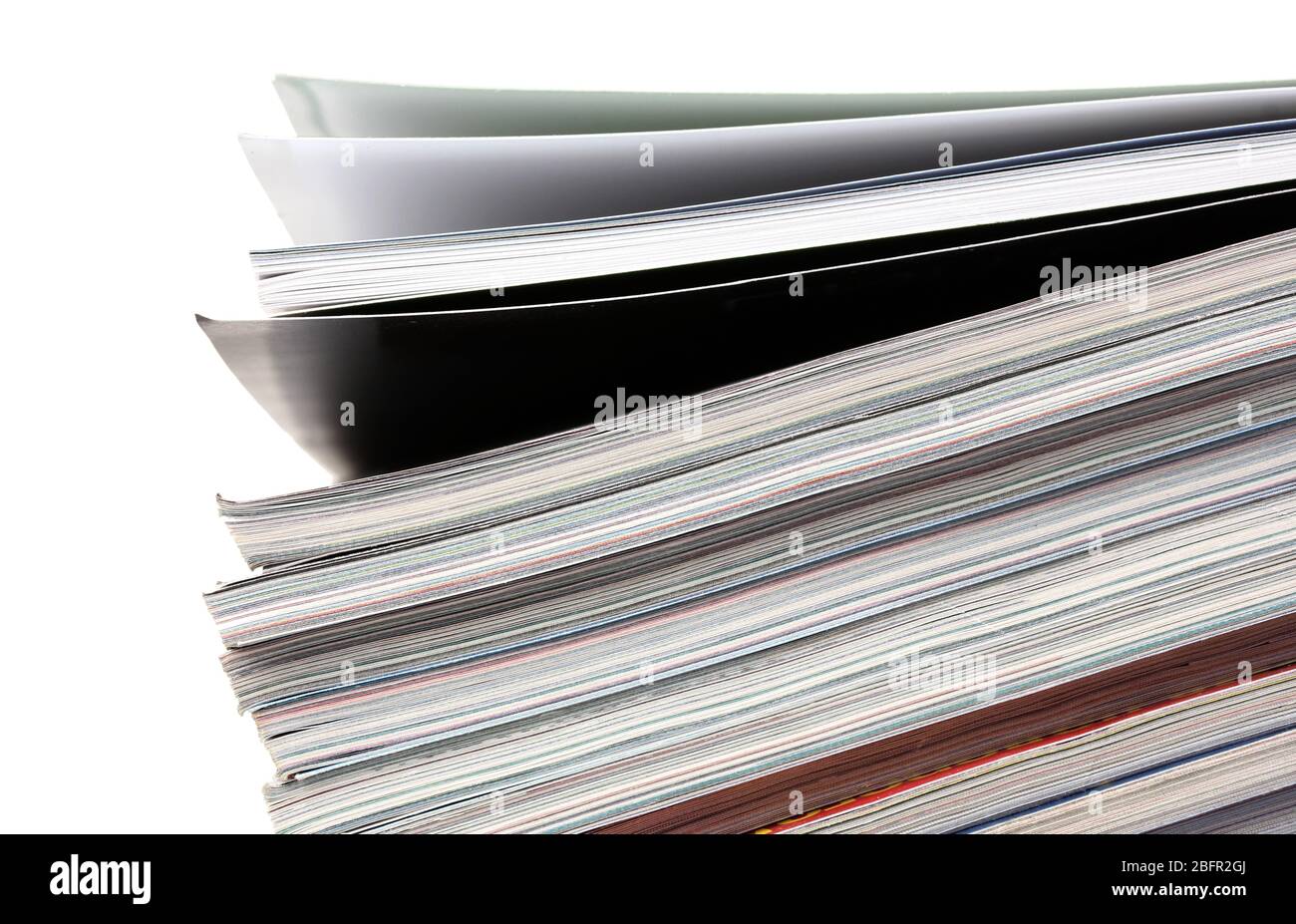 stack of magazines isolated on white Stock Photo - Alamy