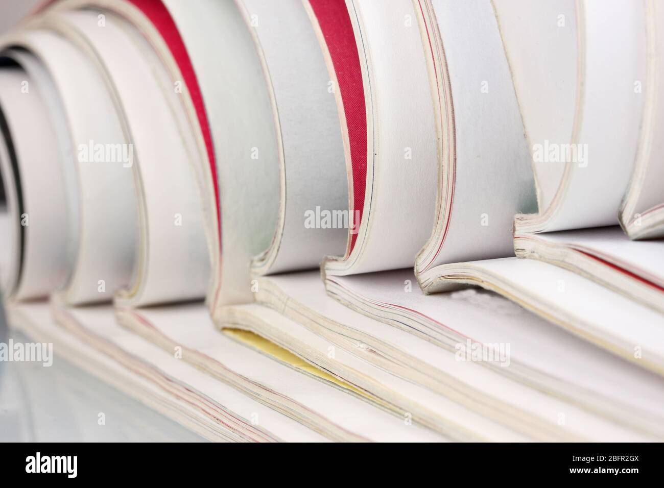 open magazines closeup Stock Photo - Alamy