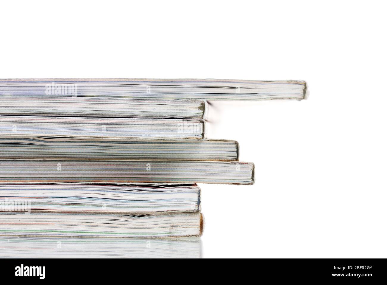 stack of magazines isolated on white Stock Photo - Alamy