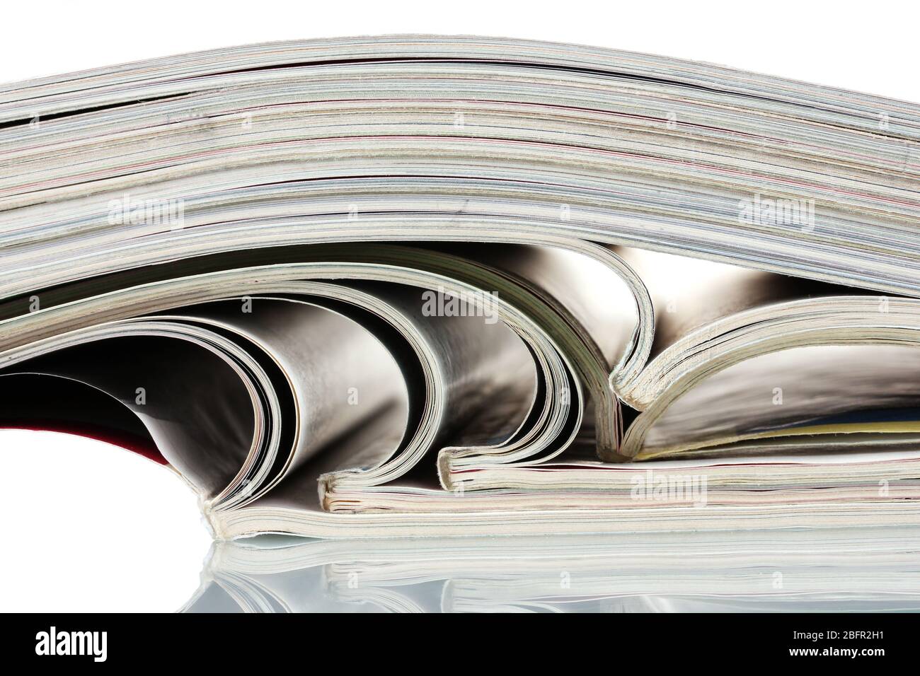 open magazines isolated on white Stock Photo - Alamy