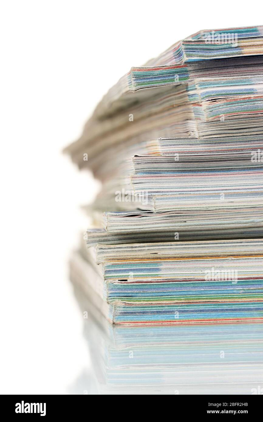 stack of magazines isolated on white Stock Photo - Alamy