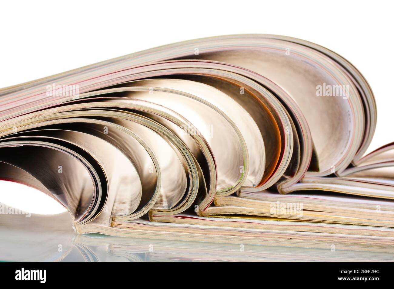 open magazines isolated on white Stock Photo - Alamy