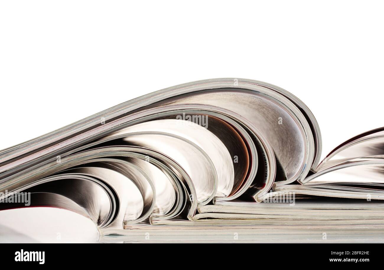 open magazines isolated on white Stock Photo - Alamy