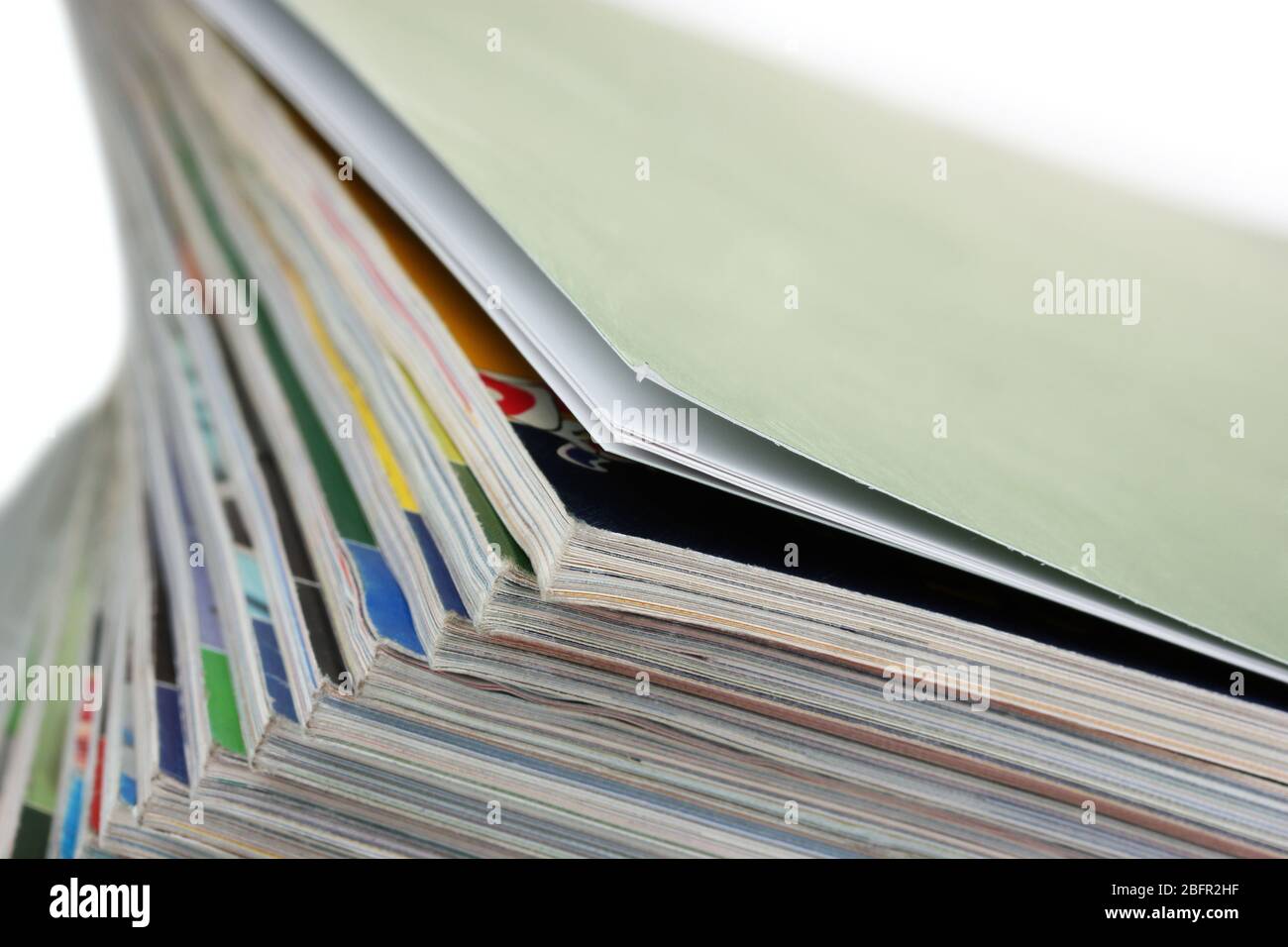 stack of magazines isolated on white Stock Photo - Alamy
