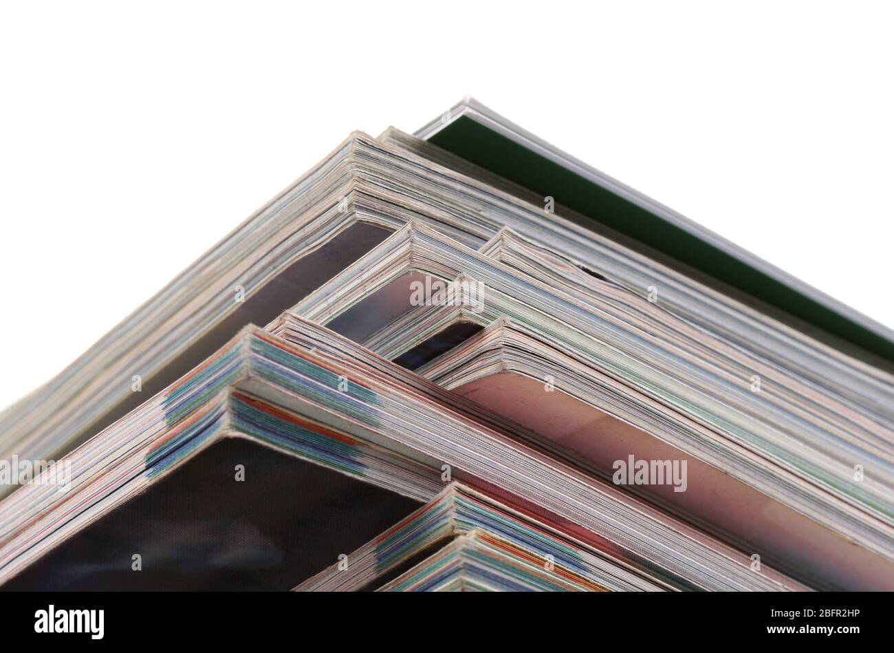 stack of magazines isolated on white Stock Photo - Alamy