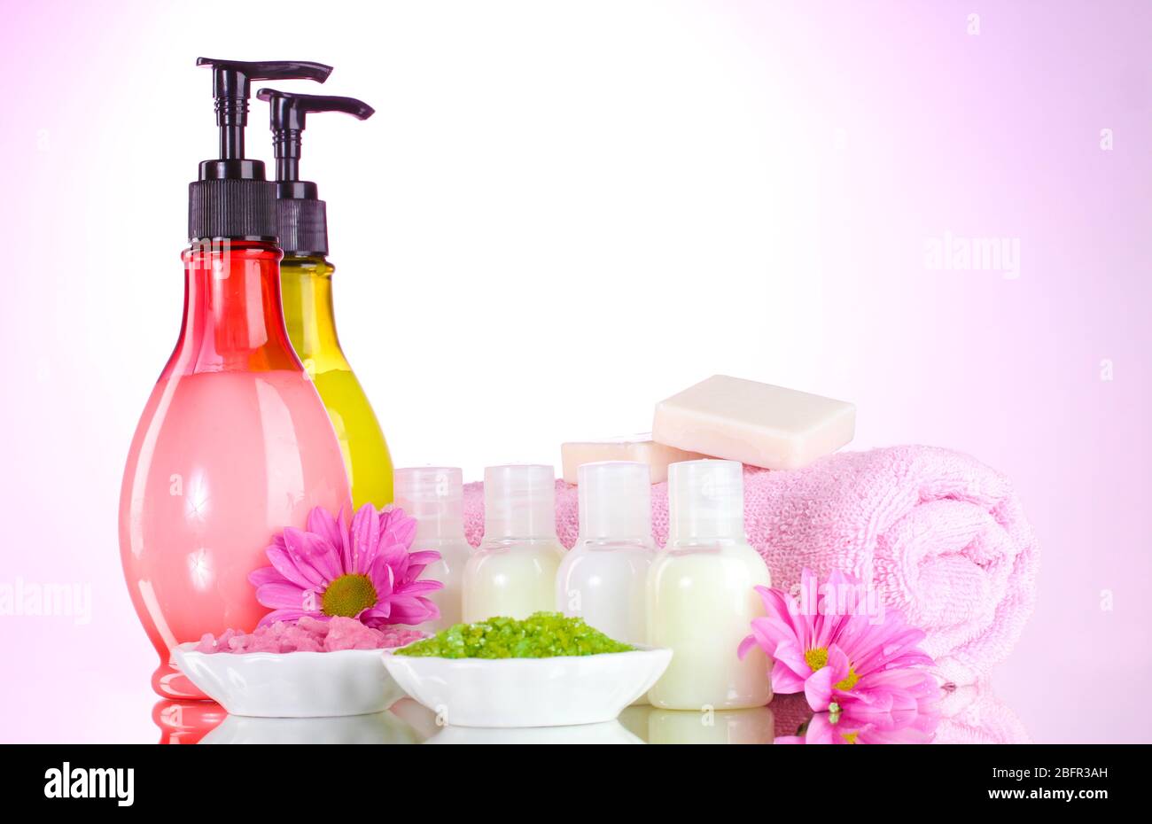 Hotel amenities kit on pink background Stock Photo - Alamy