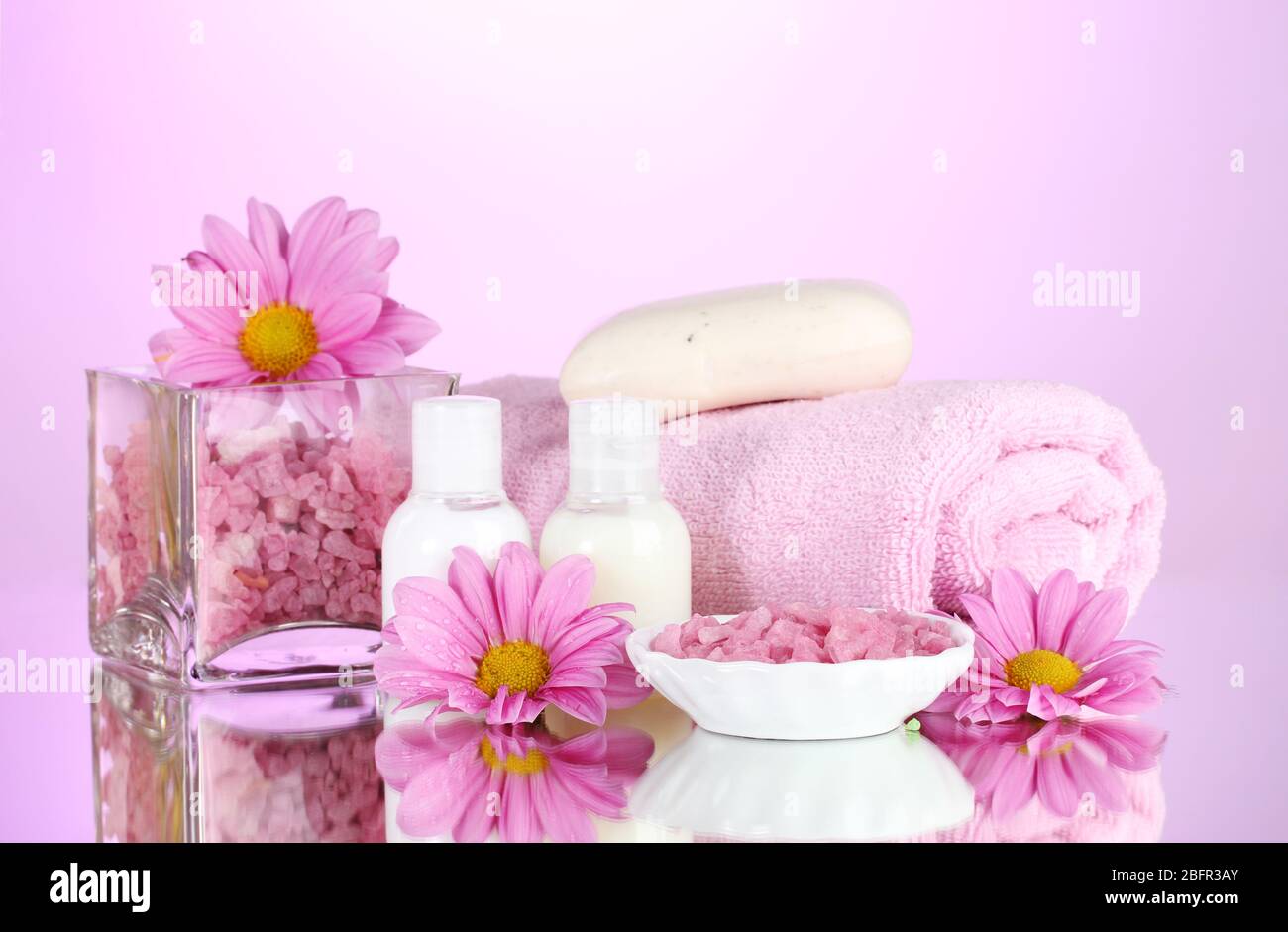 Hotel amenities kit on pink background Stock Photo - Alamy