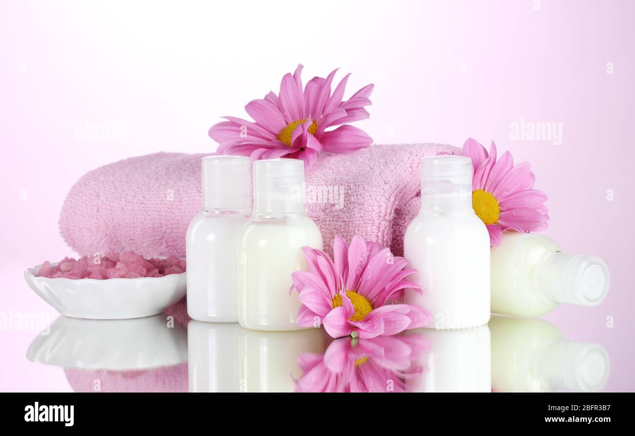 Hotel amenities kit on pink background Stock Photo - Alamy