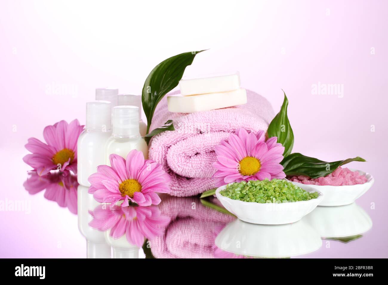 Hotel amenities kit on pink background Stock Photo - Alamy