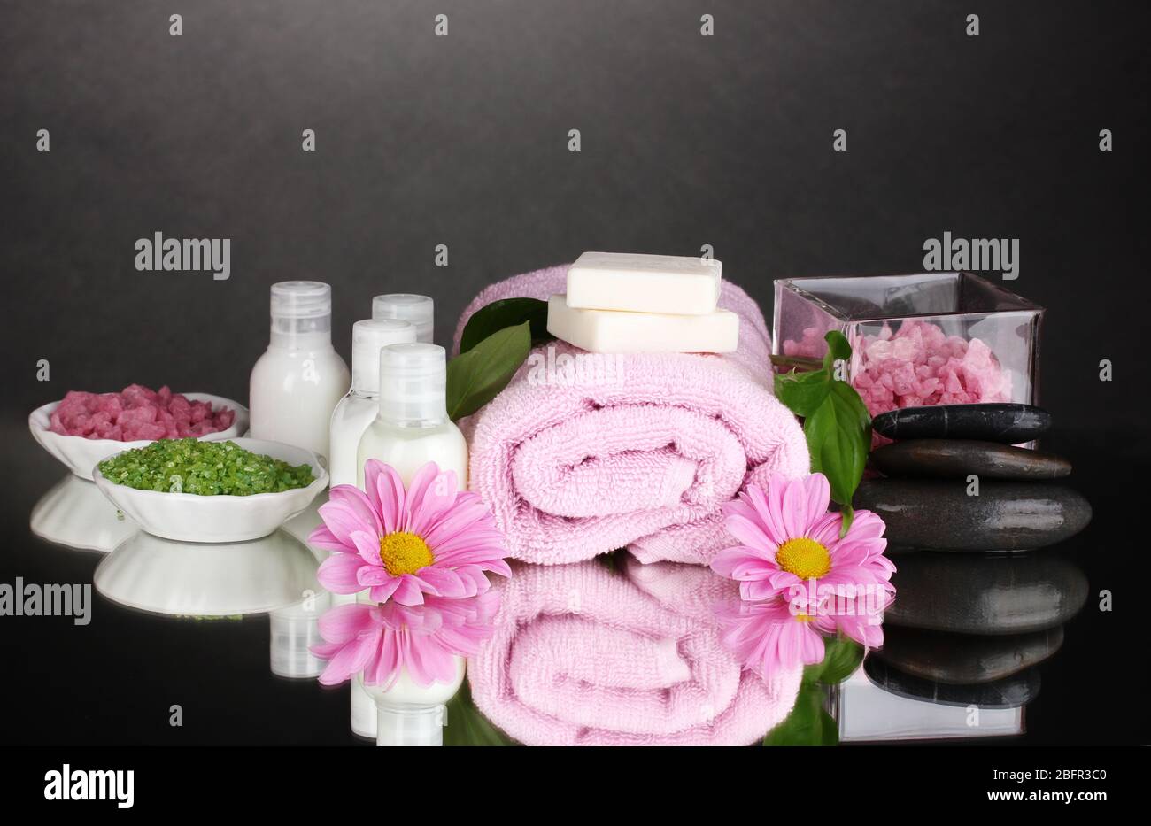 Hotel amenities kit on gray background Stock Photo - Alamy