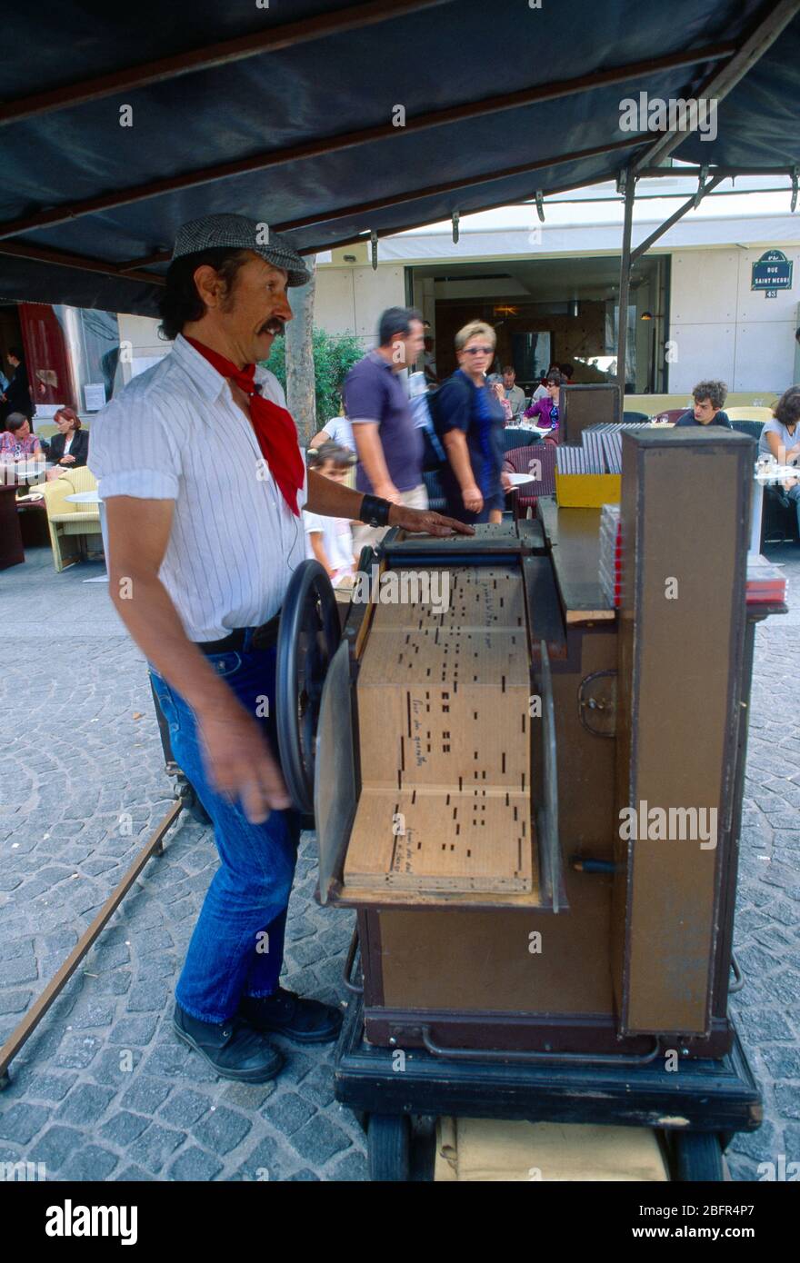 Street organ man hi-res stock photography and images - Alamy