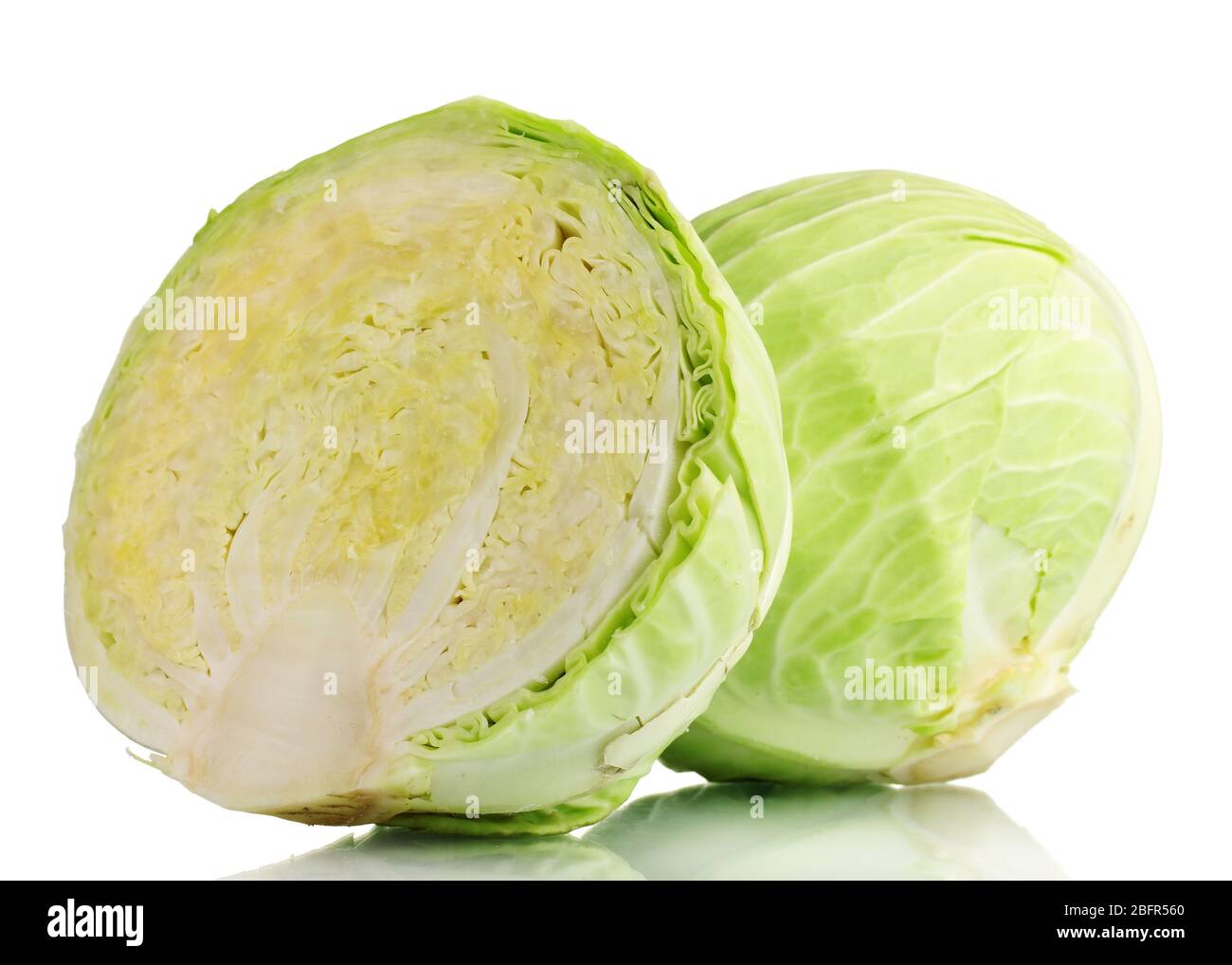 Whole cabbage and half isolated on white Stock Photo - Alamy