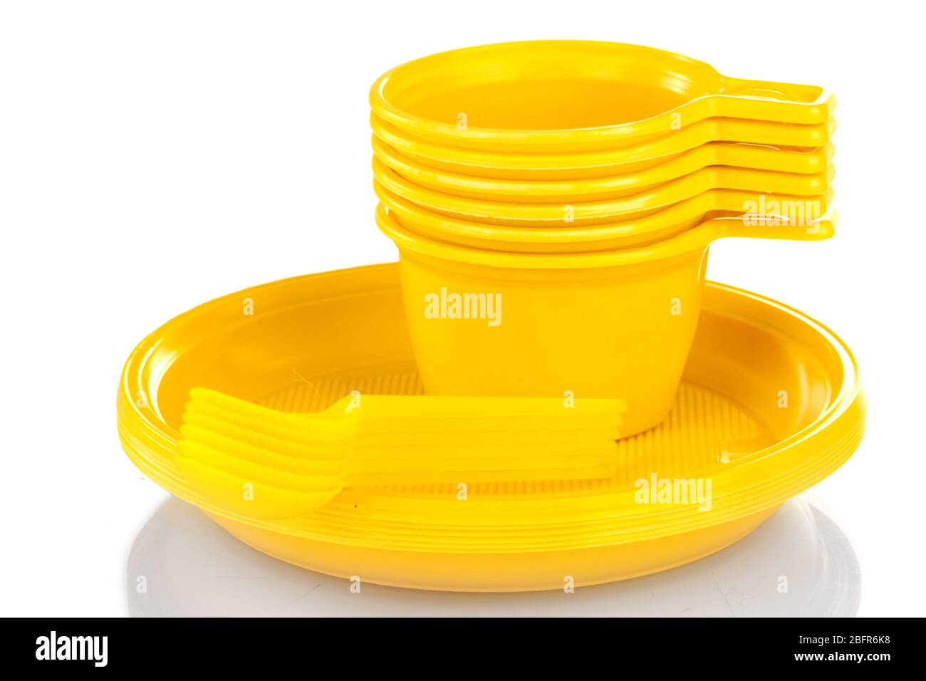 Yellow plastic plate spoons hi-res stock photography and images - Alamy