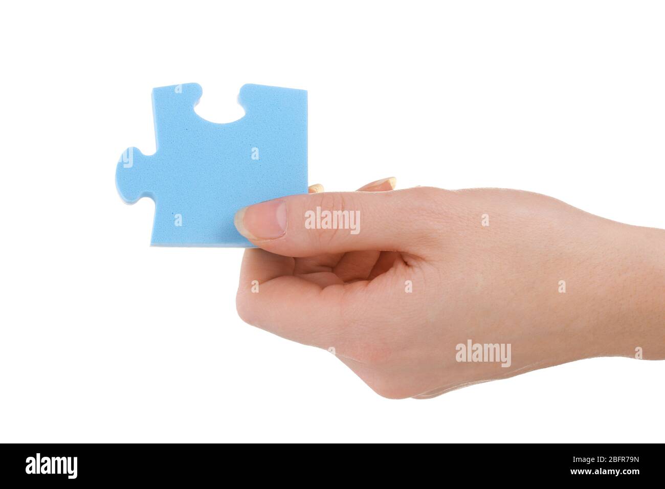 Hand and puzzle, isolated on white Stock Photo - Alamy