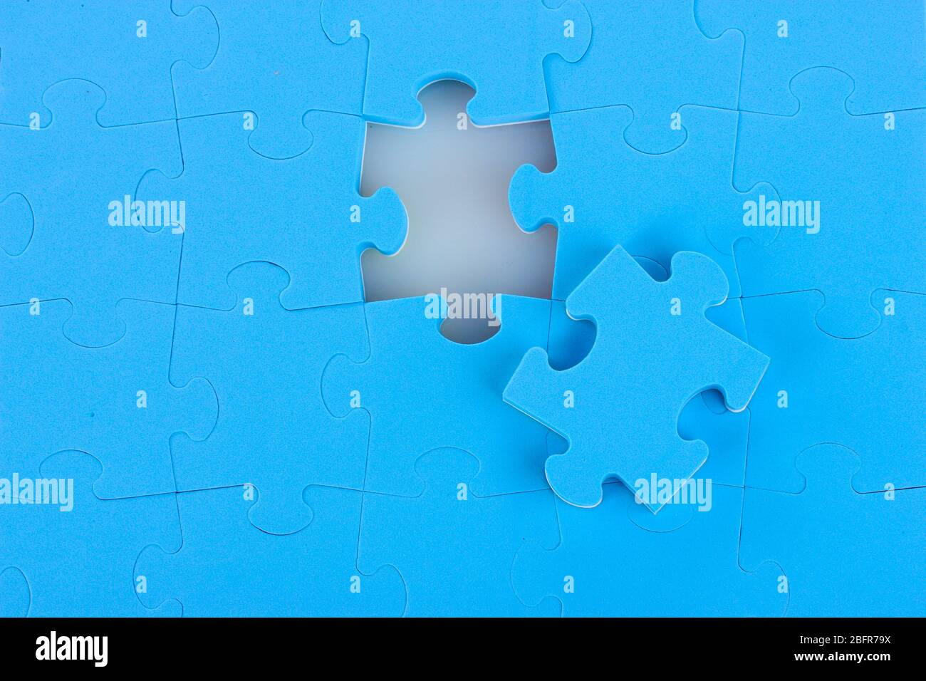 Blue puzzles hi-res stock photography and images - Alamy