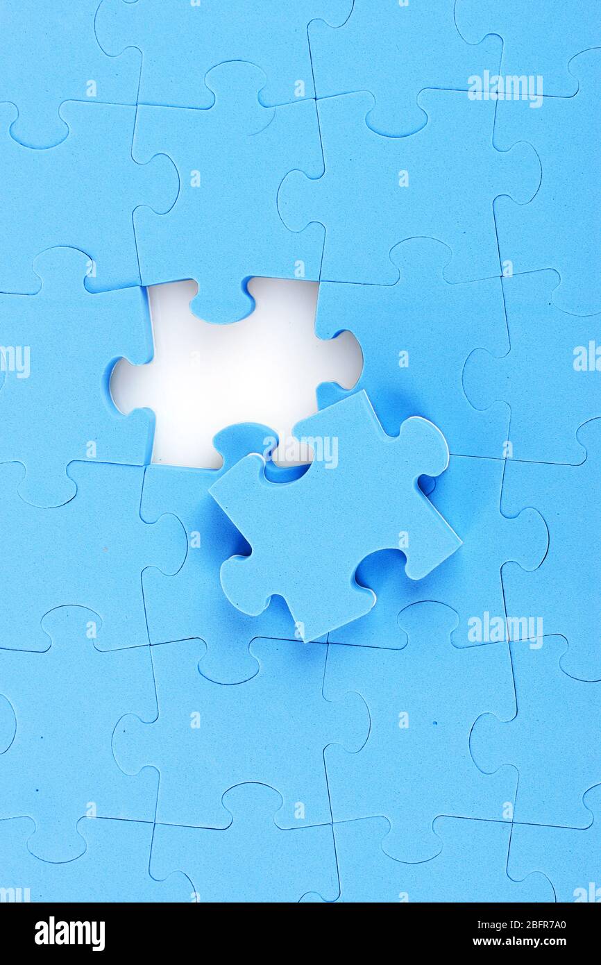 Blue puzzles closeup Stock Photo - Alamy