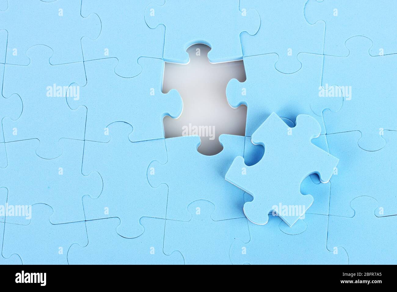 Blue puzzles closeup Stock Photo - Alamy
