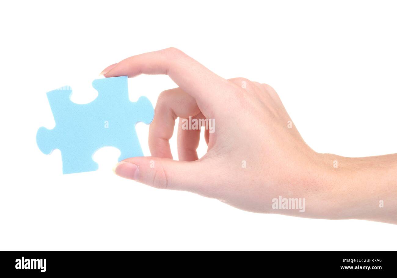 Hand and puzzle, isolated on white Stock Photo - Alamy
