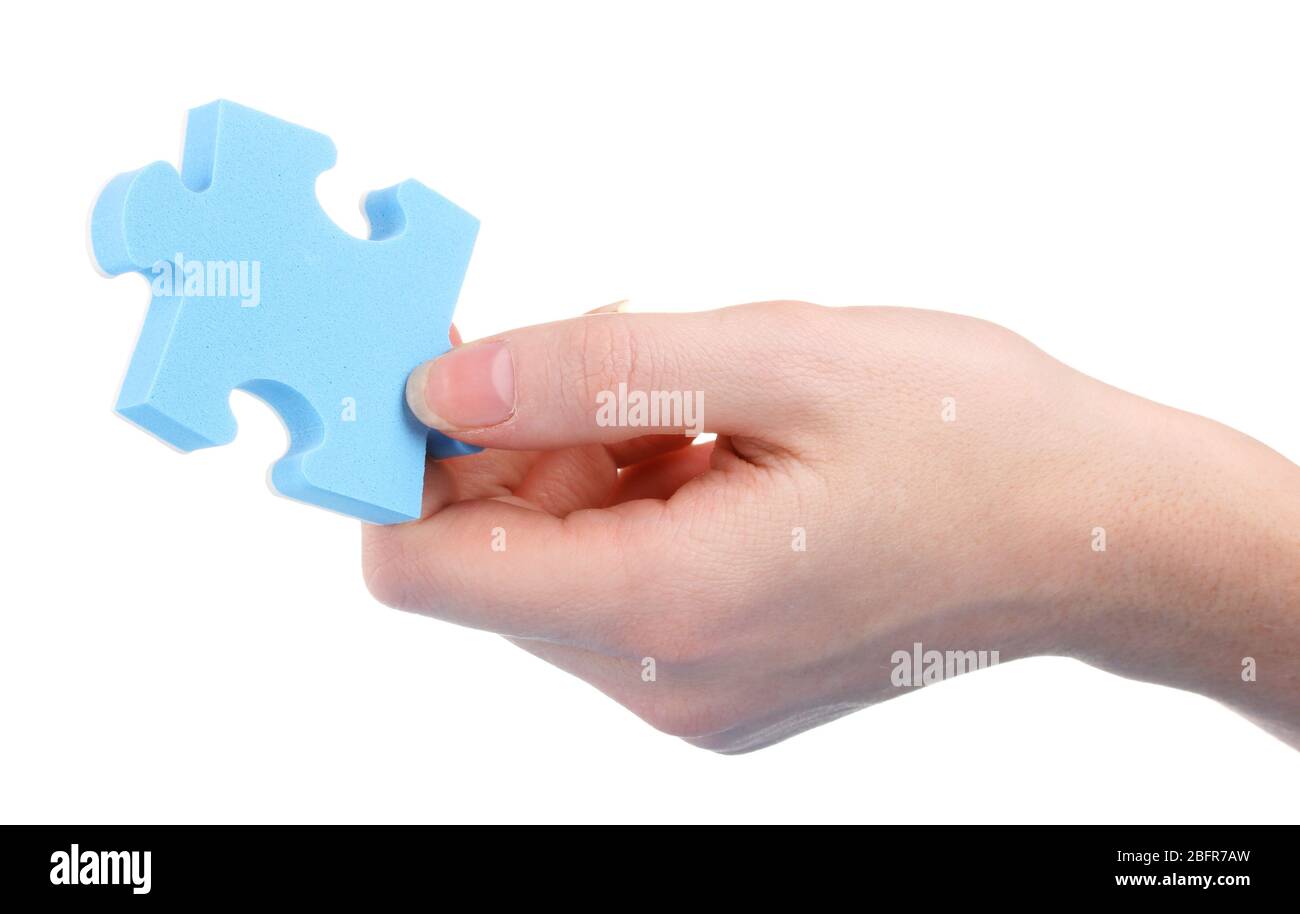 Hand and puzzle, isolated on white Stock Photo - Alamy