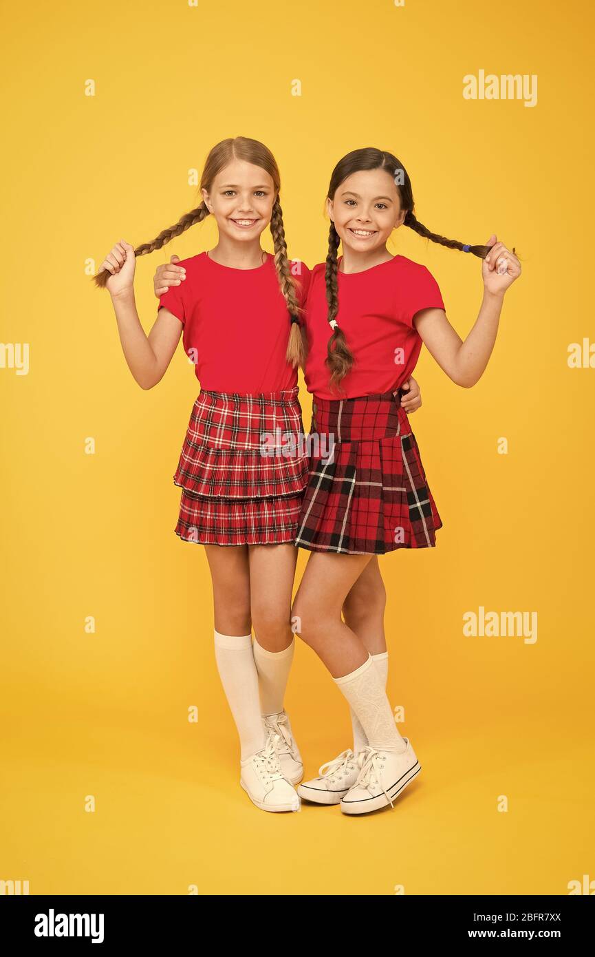 True friends. Cheerful friends. Happy together. School girls having fun ...