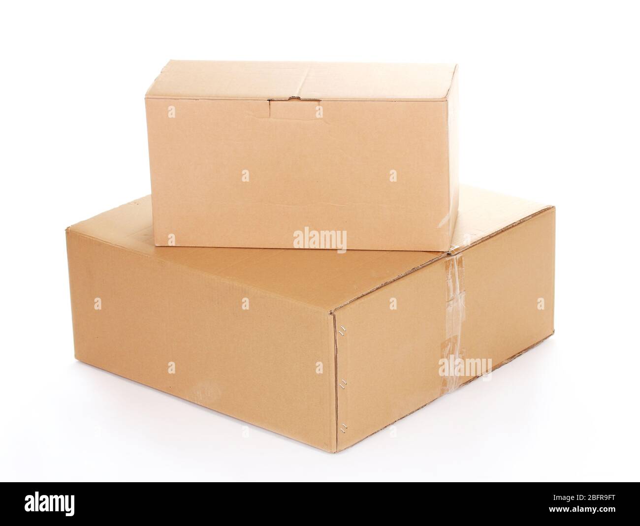 two closed cardboard boxes isolated on white Stock Photo - Alamy