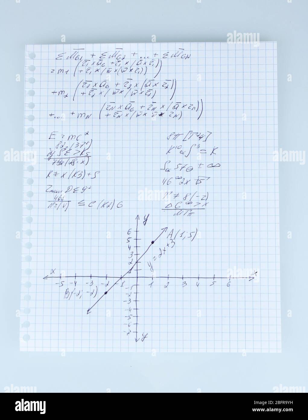 Physics and geometry on copybook page isolated on white Stock Photo - Alamy