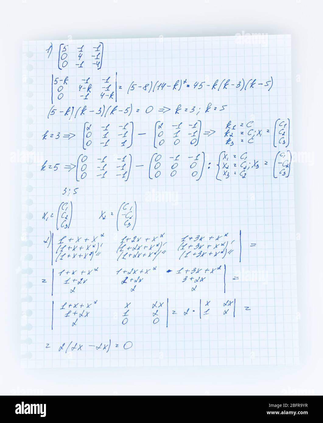 Math on copybook page isolated on white Stock Photo - Alamy