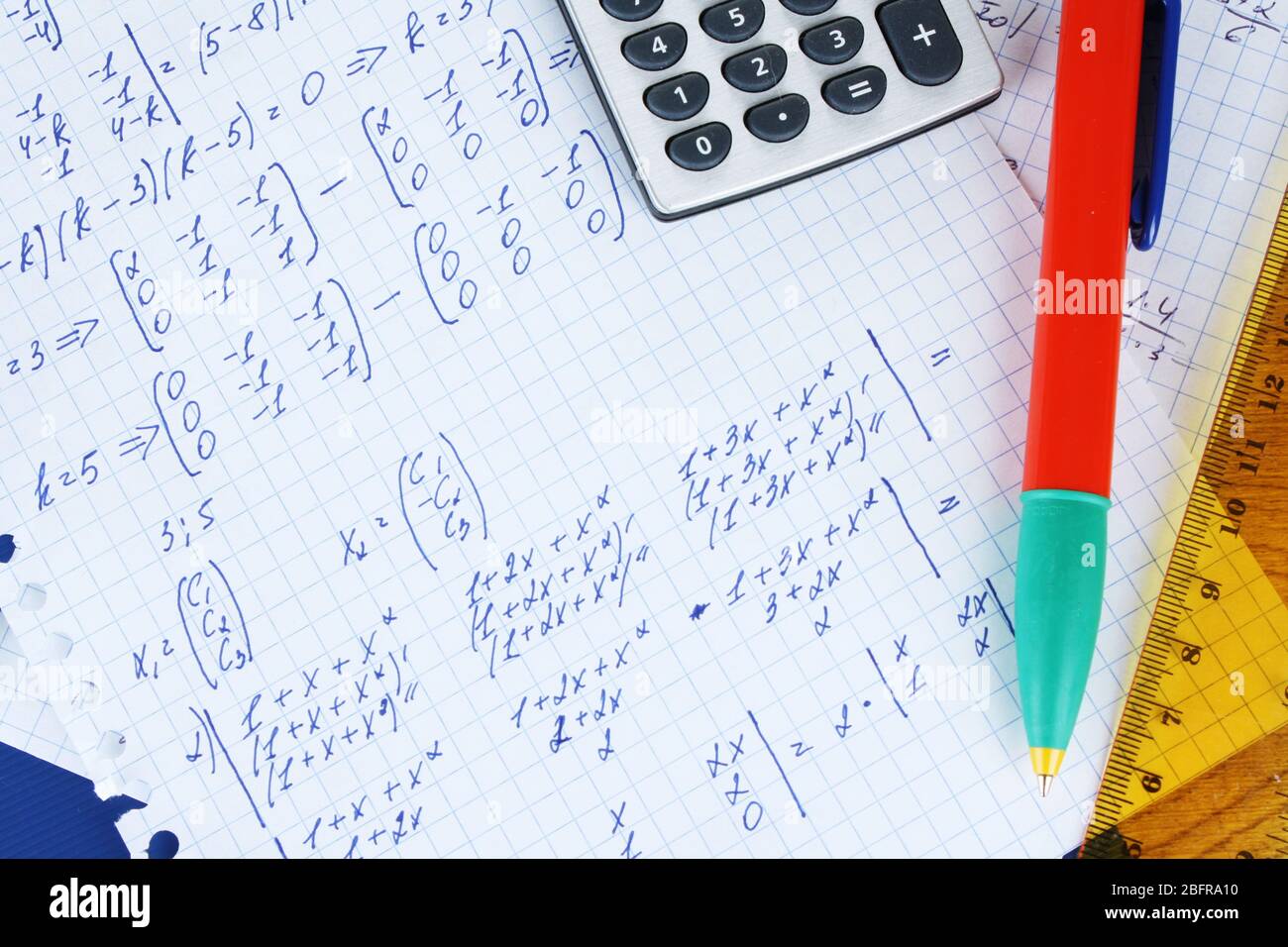 Math on copybook page closeup Stock Photo - Alamy