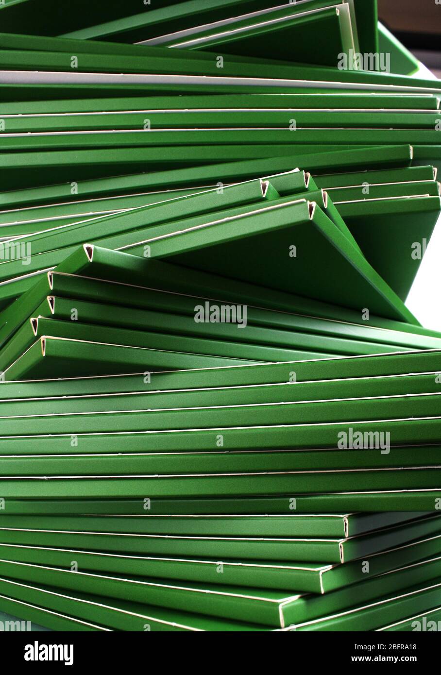 Many green folders closeup Stock Photo - Alamy