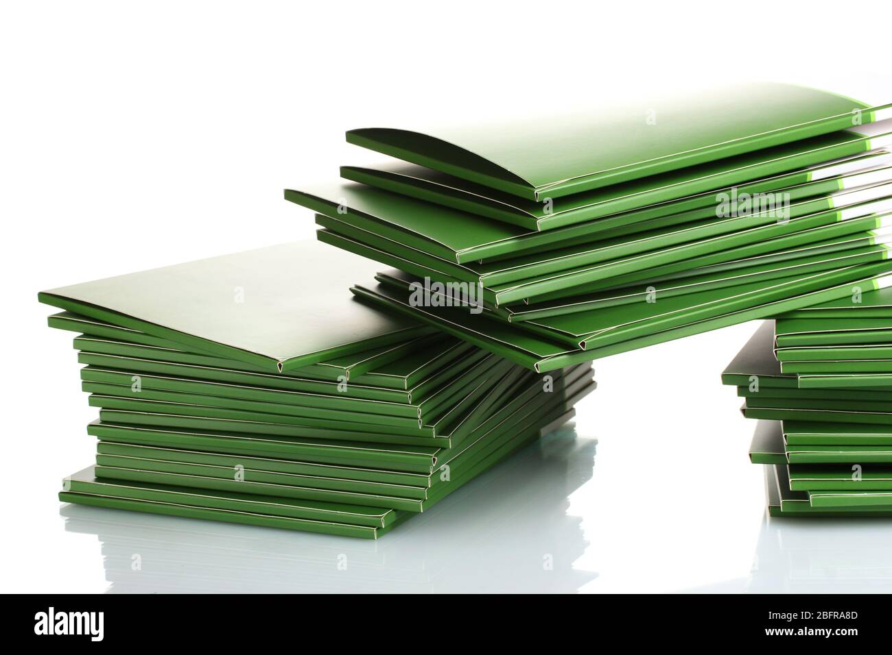 Many green folders isolated on white Stock Photo - Alamy