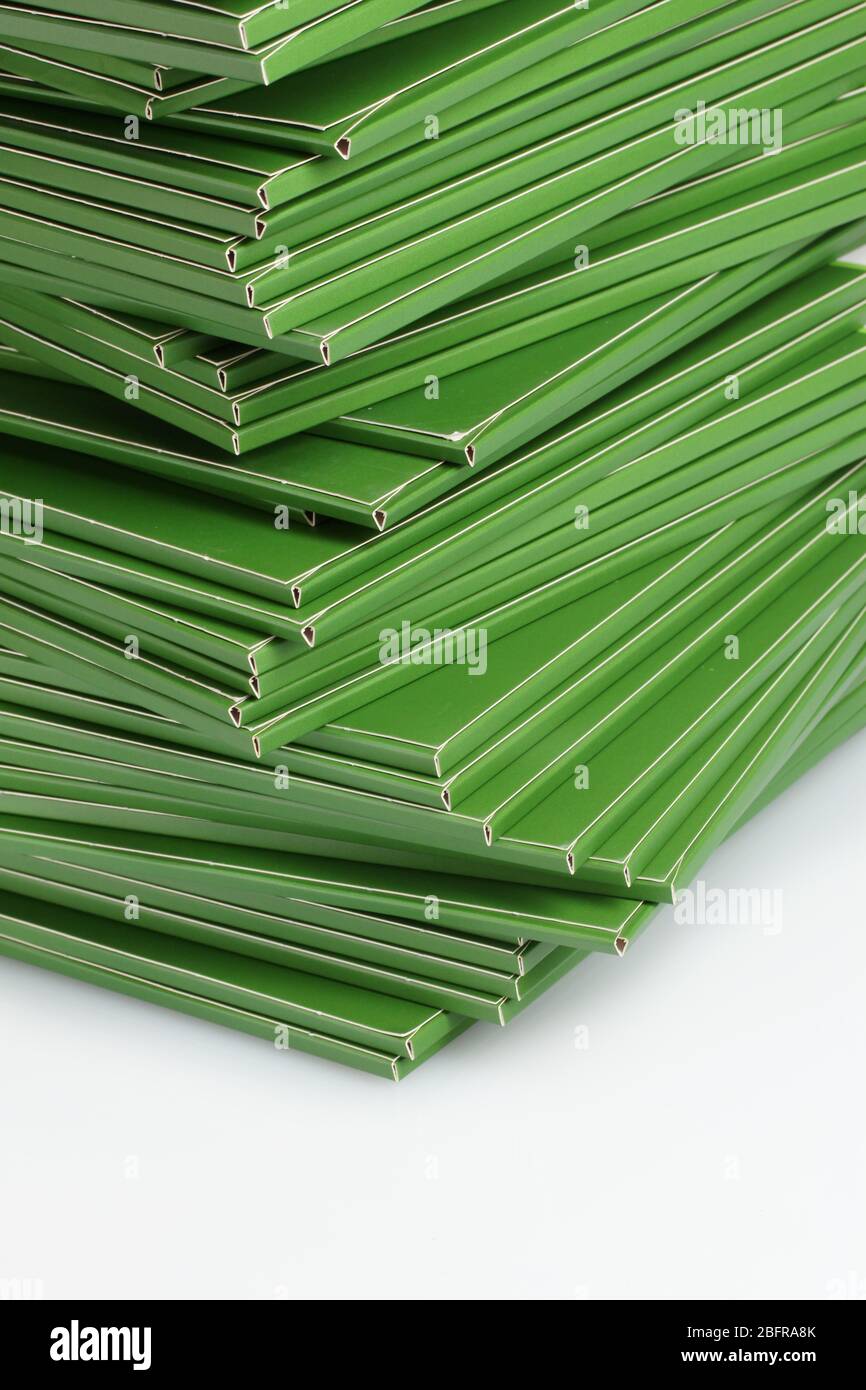 Many green folders closeup Stock Photo - Alamy