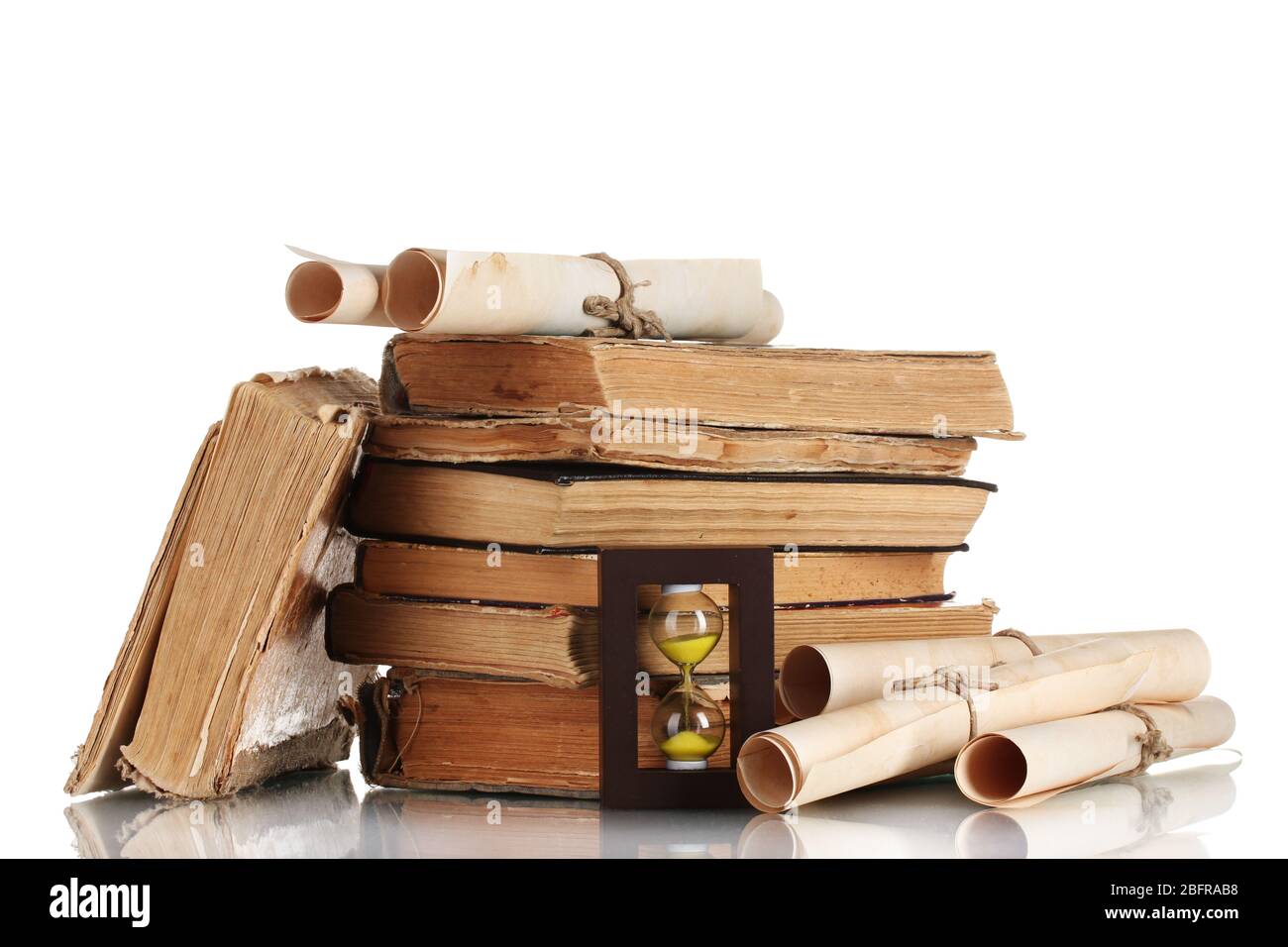Pile of old books and scroll isolated on white Stock Photo - Alamy