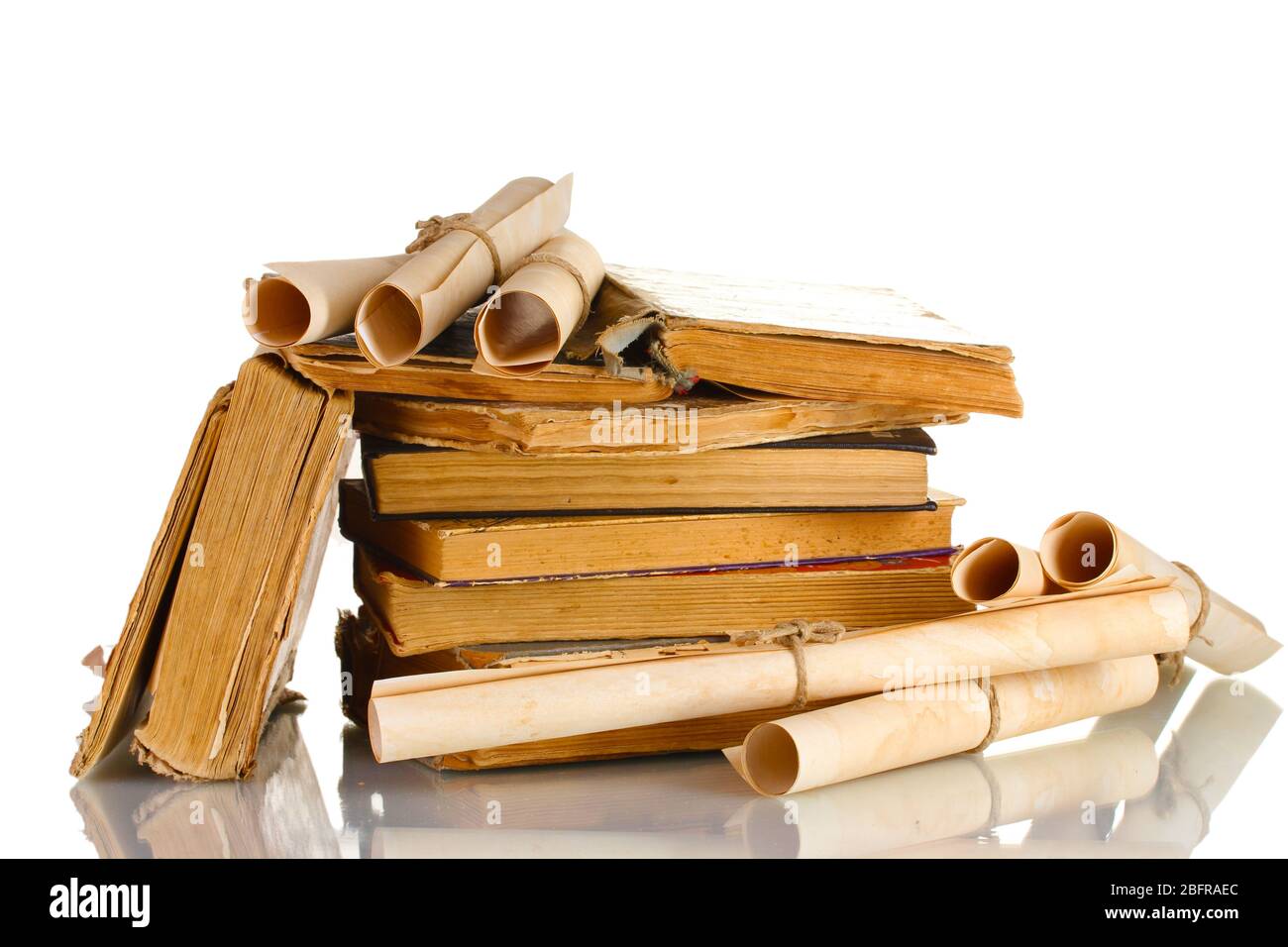 Pile of old books and scroll isolated on white Stock Photo - Alamy